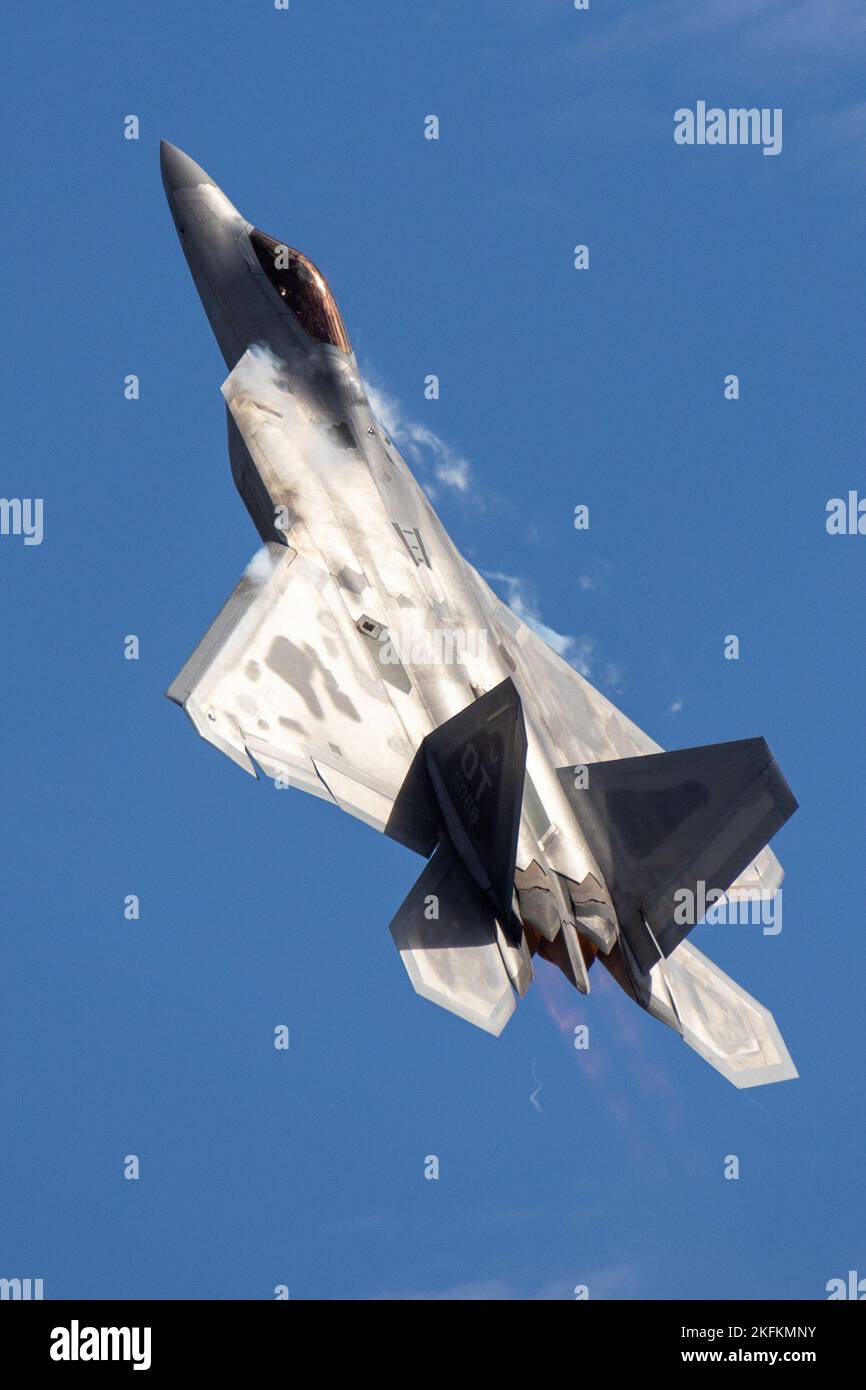 A U.S. Air Force F-22 Raptor conducts a heritage flight during the 2022 ...