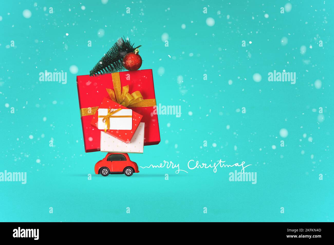 Minimal christmas card concept, red small car transports many christmas ...