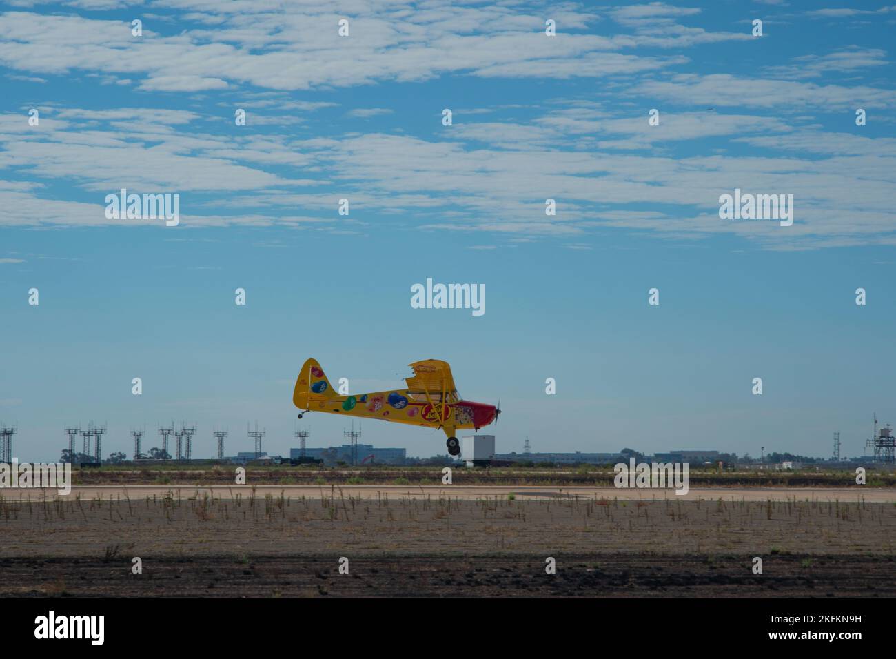 Kent Pietsch, piloting his Interstate Cadet, performs aerobatics during ...