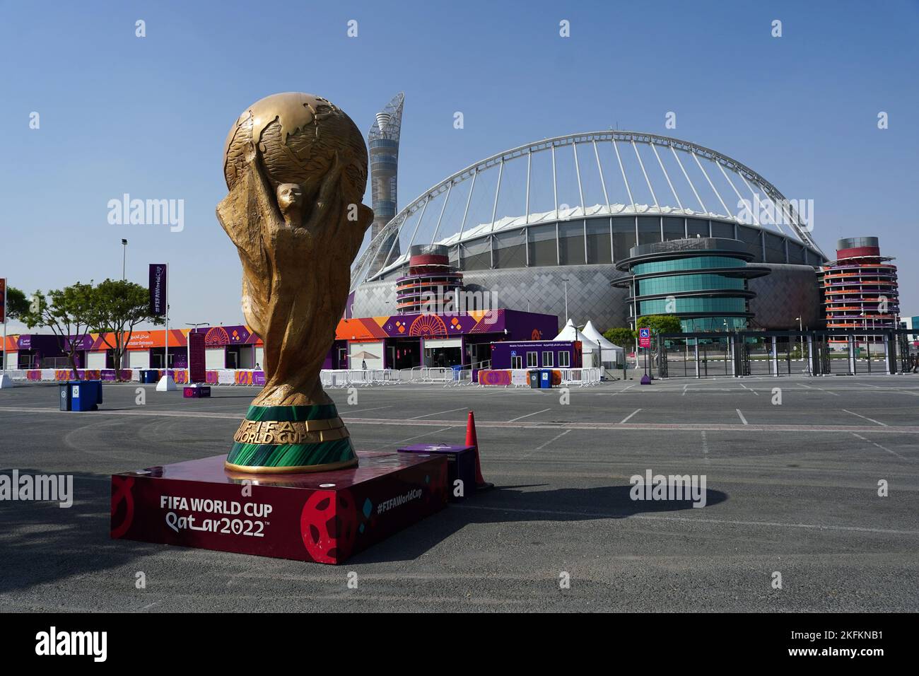 A giant world cup replica outside of the Khalifa International Stadium ...