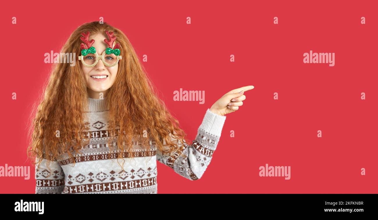 Girl inviting check-out holiday prices and special Christmas discounts ...