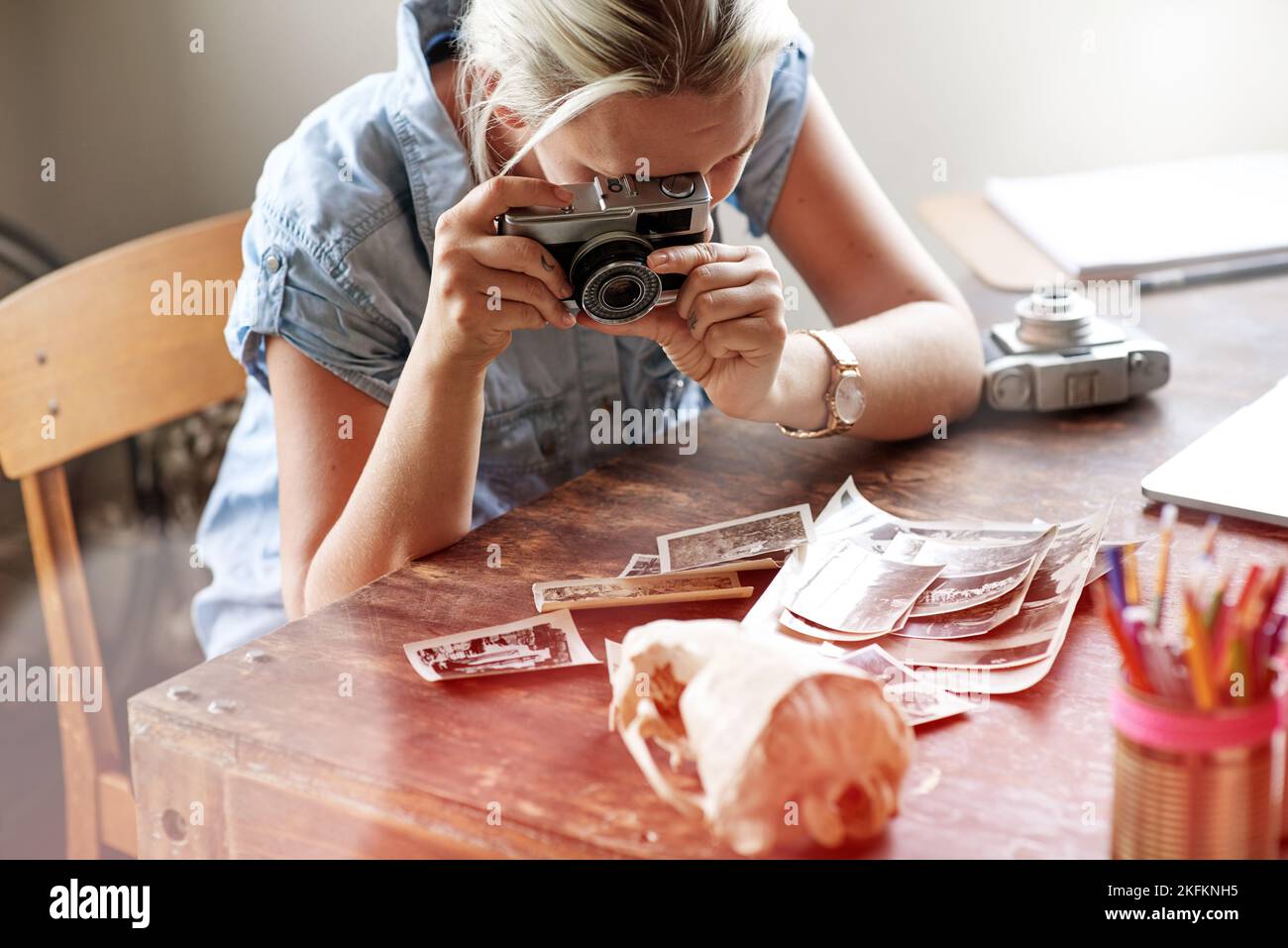 Shes really getting into photography. a young female photographer ...