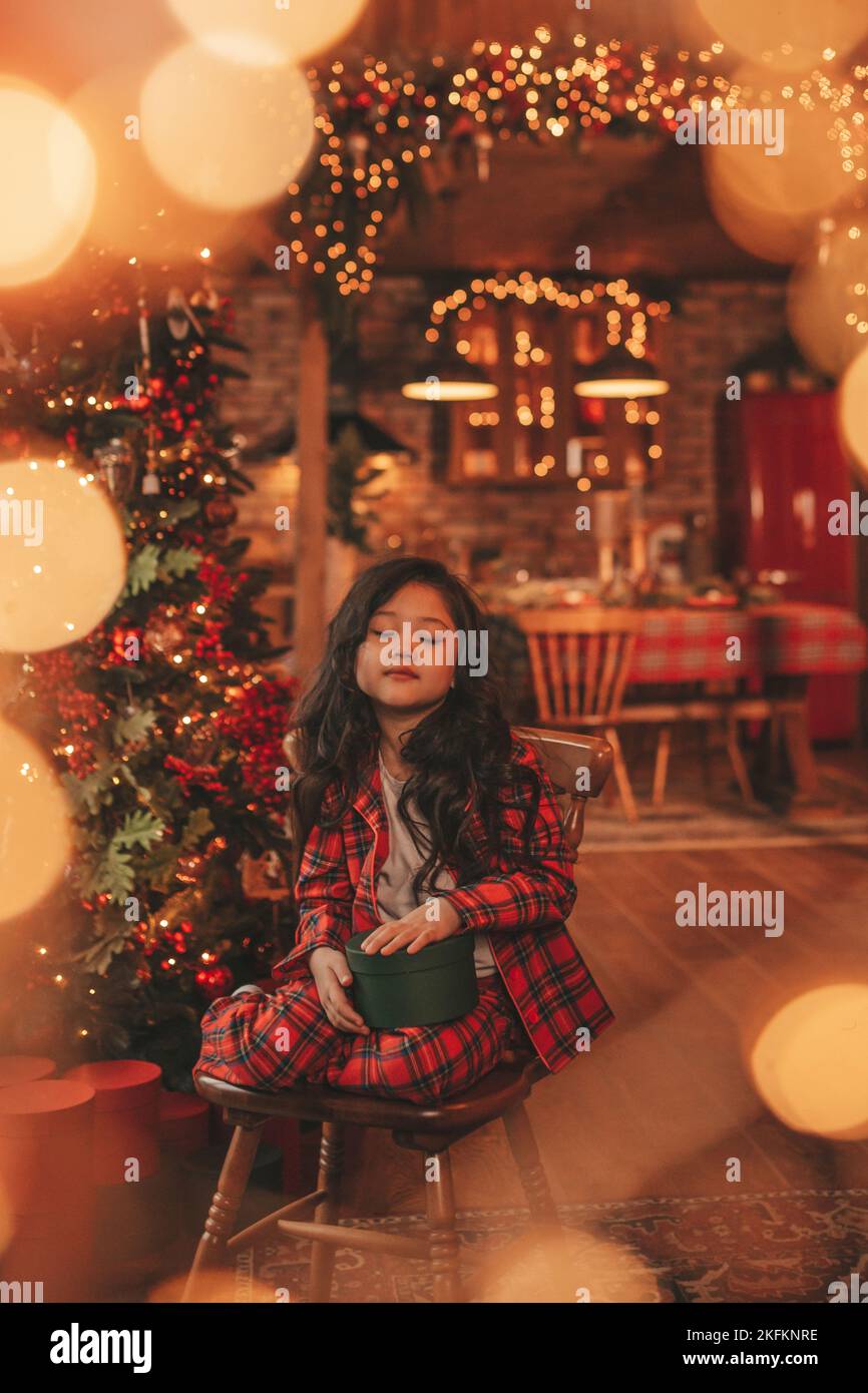 Happy japan little girl dreamer waiting miracle from Santa posing on ...