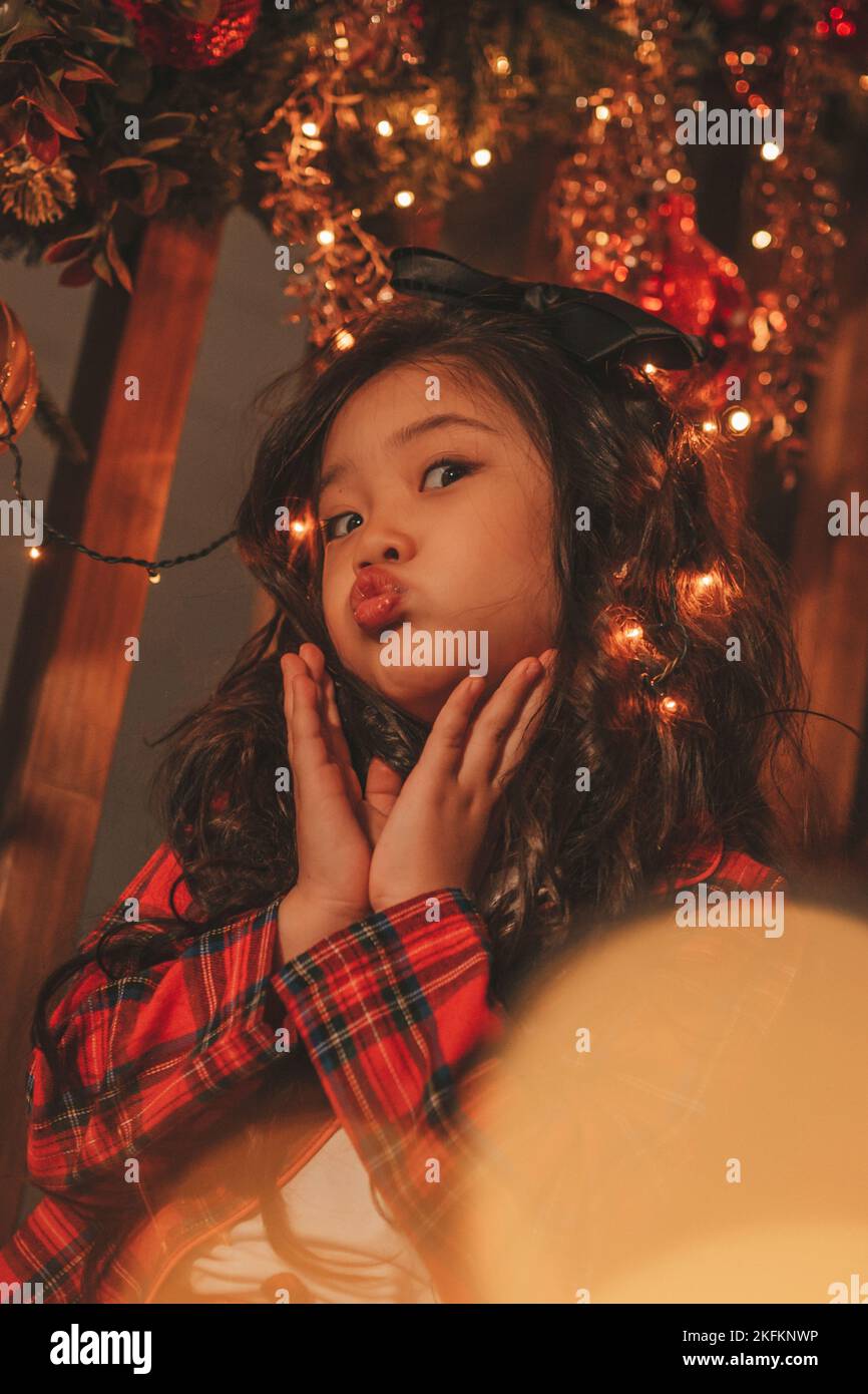 Happy japan little girl dreamer waiting miracle from Santa posing on ...