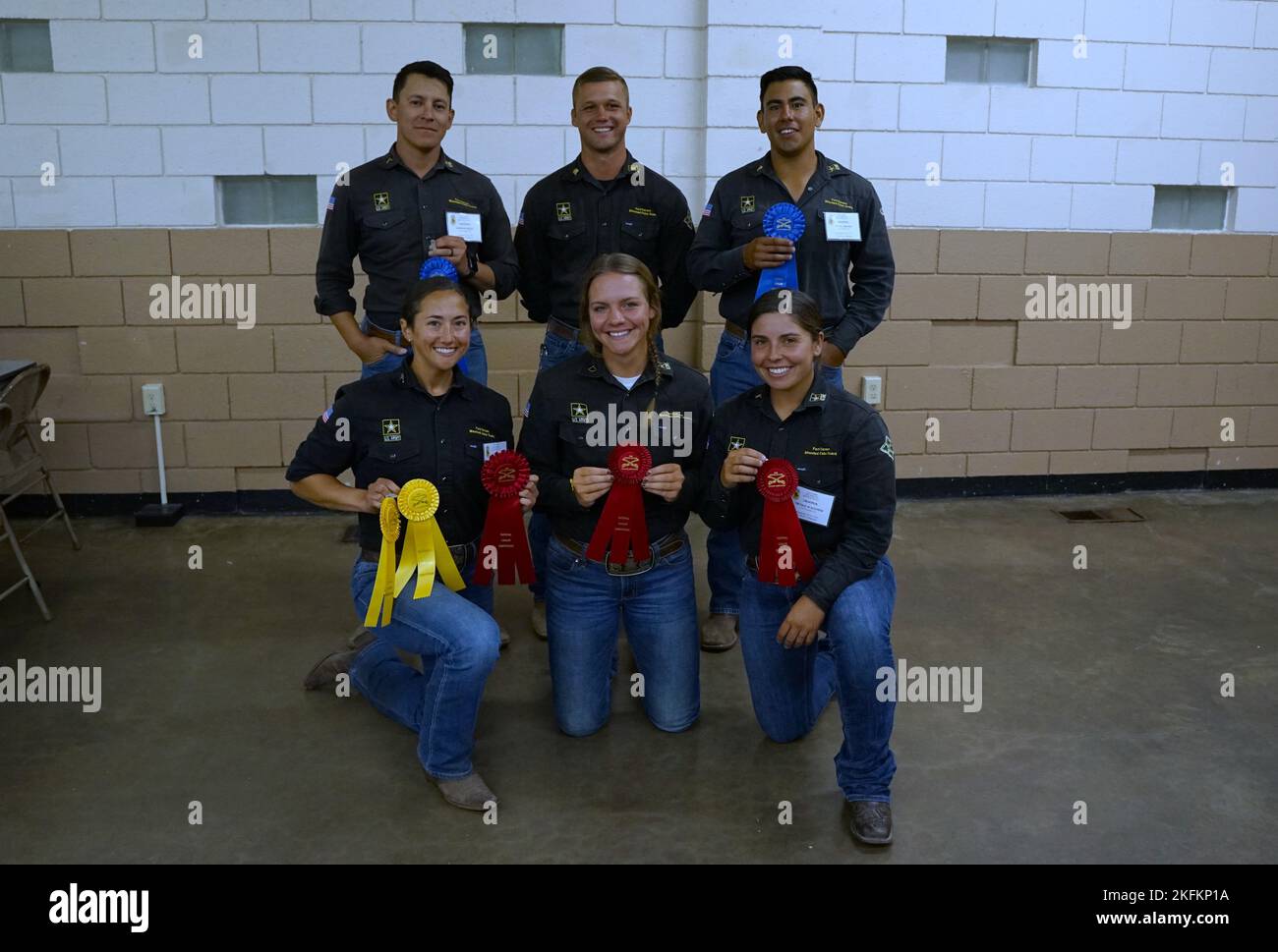 The Fort Carson Mountain Color Guard (FCMCG) winners, hold up their ...