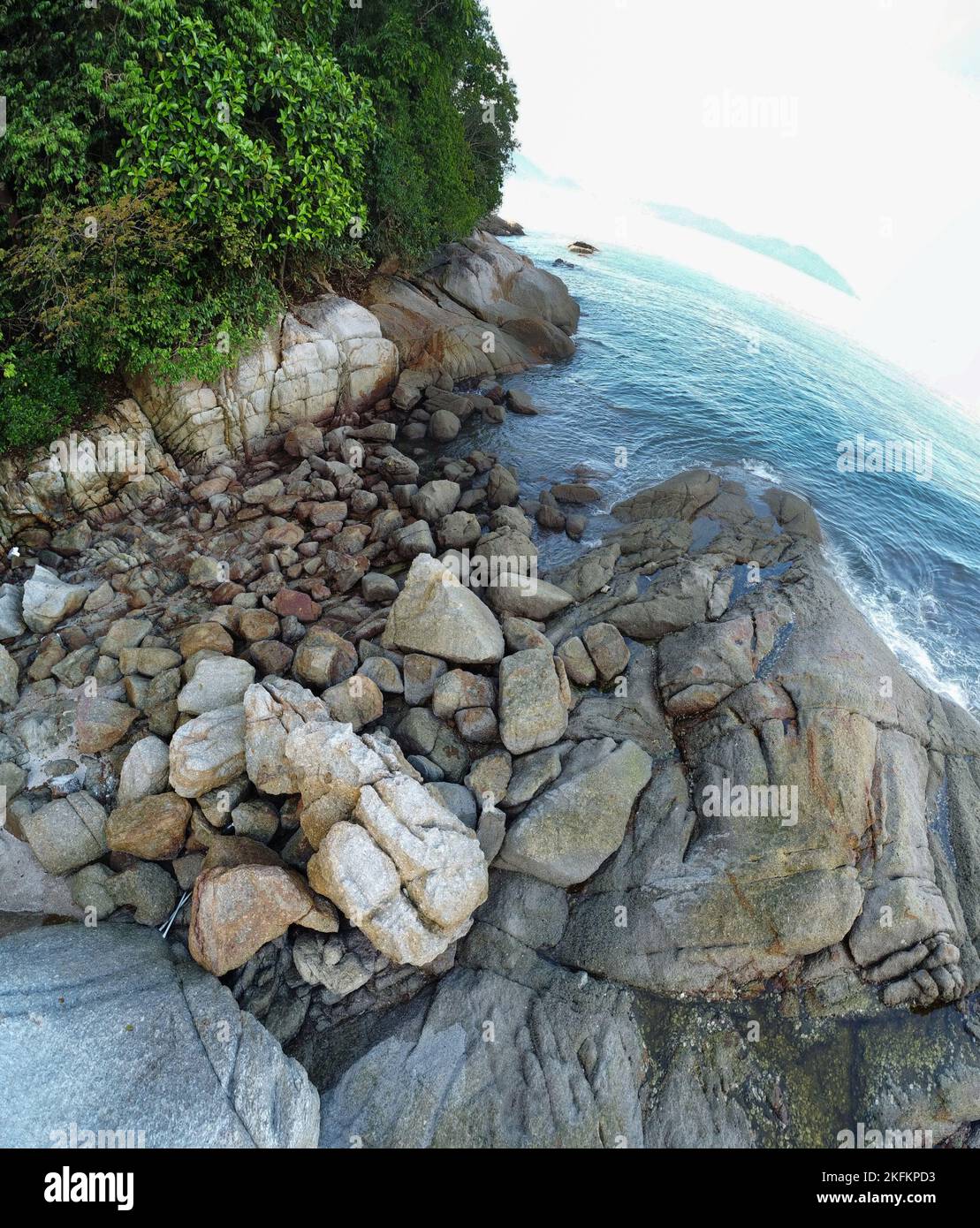 aerial image of the beach with lots of granite rocks Stock Photo - Alamy