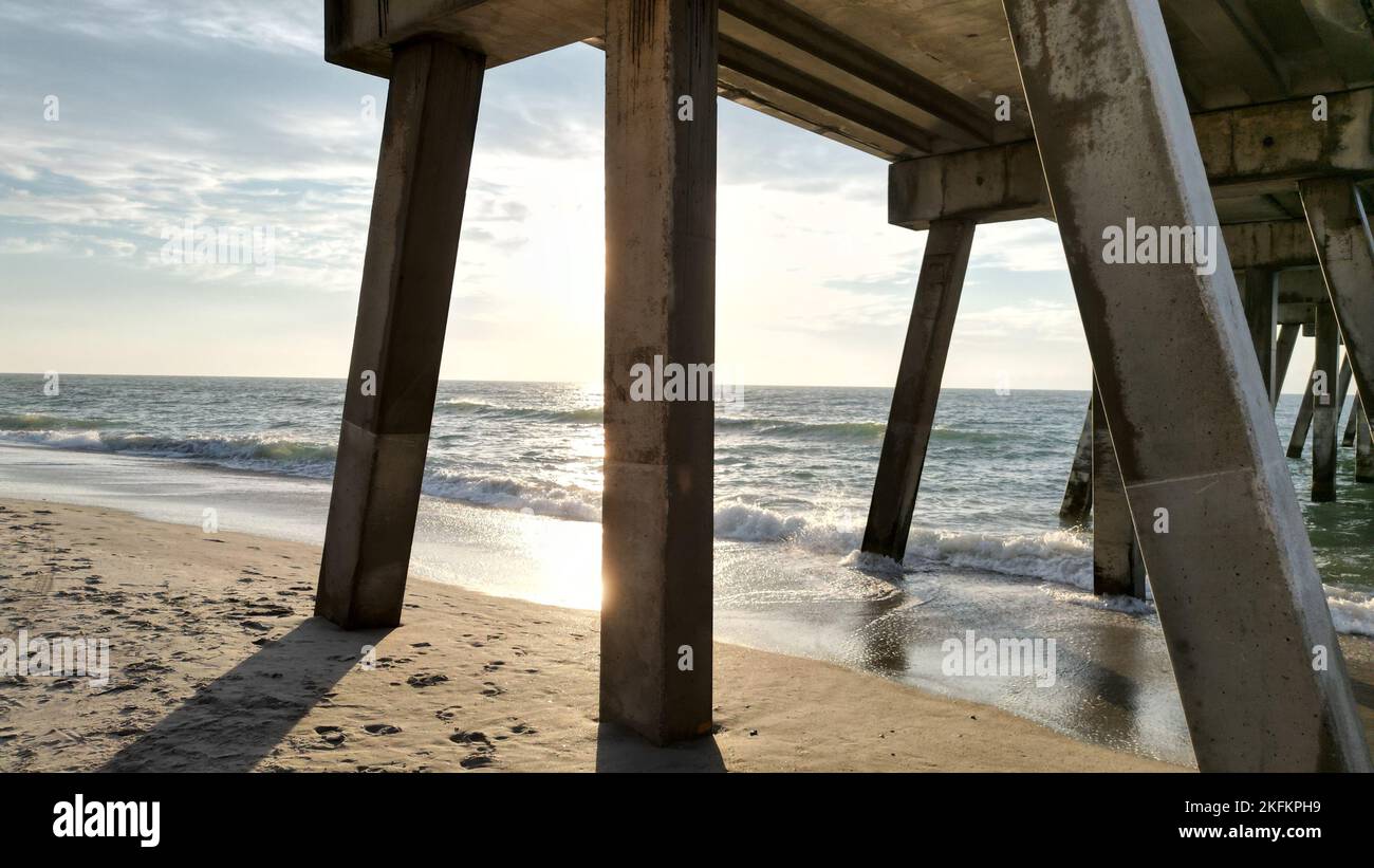 A view of sea waves breaking sandy beach Stock Photo - Alamy