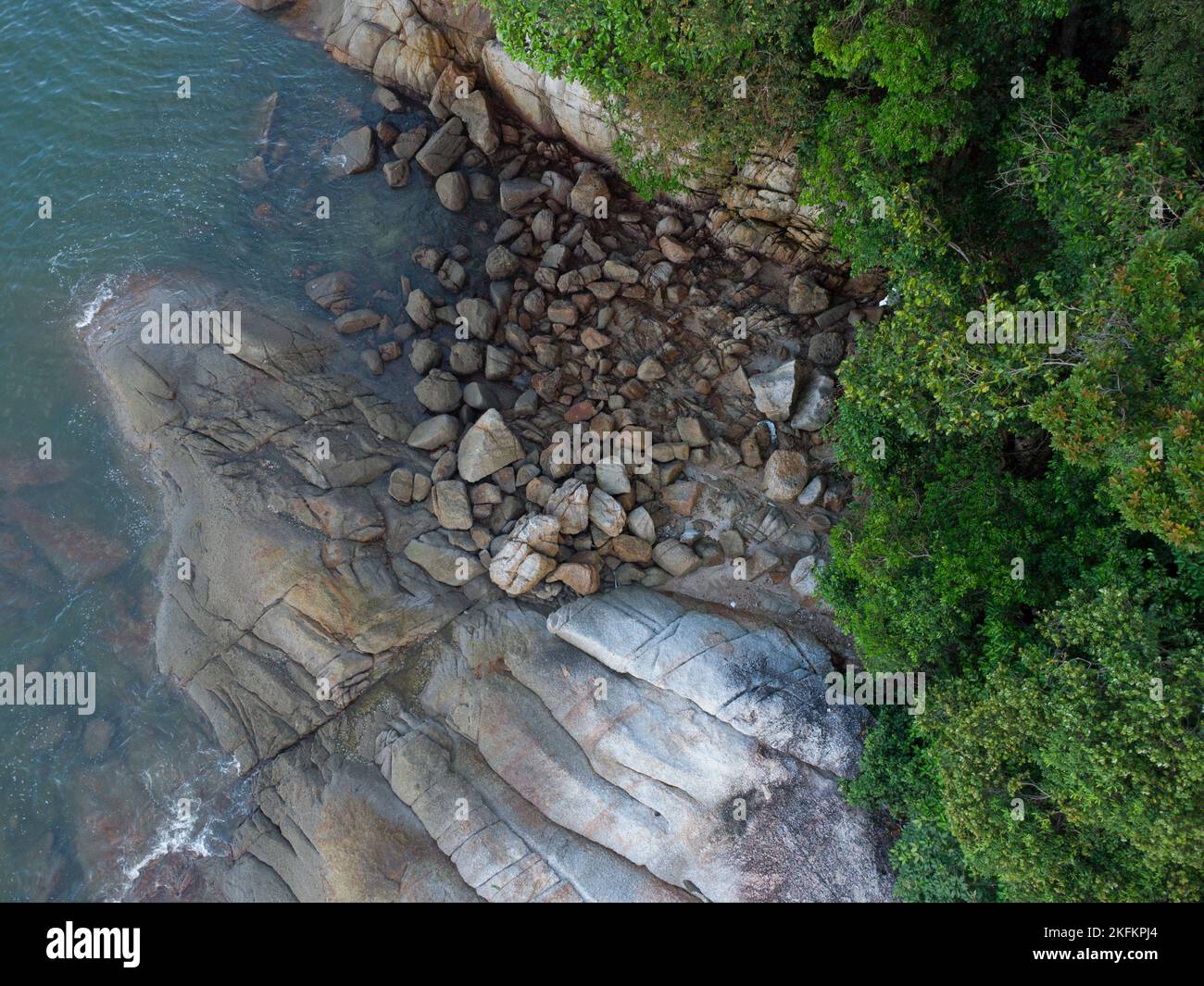 aerial image of the beach with lots of granite rocks Stock Photo - Alamy