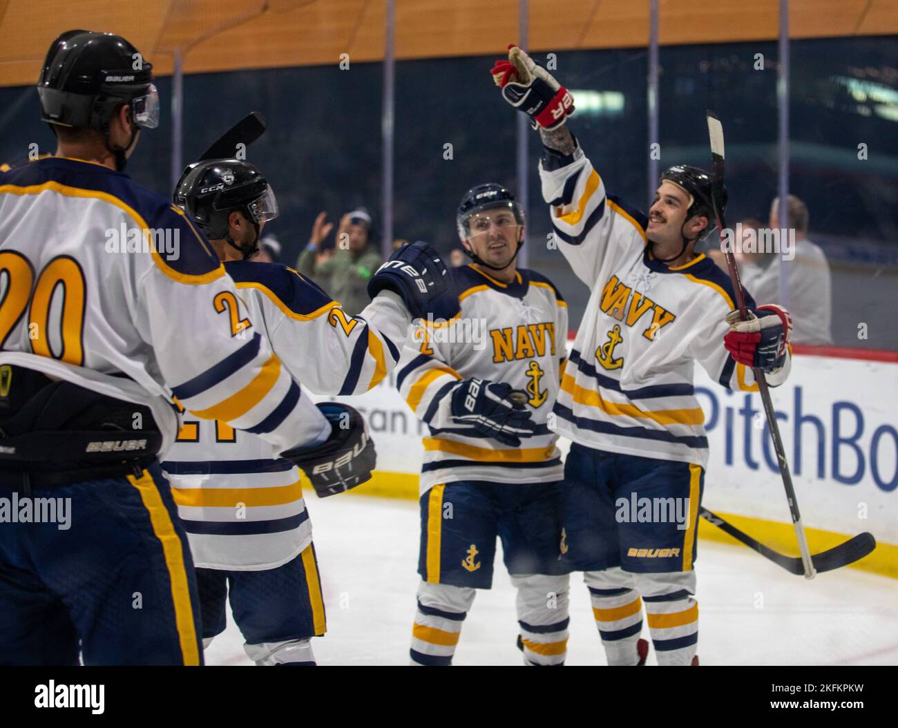 Sailors stationed in the Pacific Northwest celebrate a goal during the ...