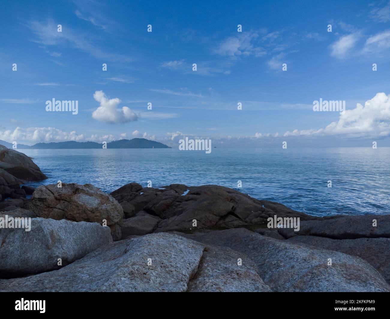 aerial image of the beach with lots of granite rocks Stock Photo - Alamy