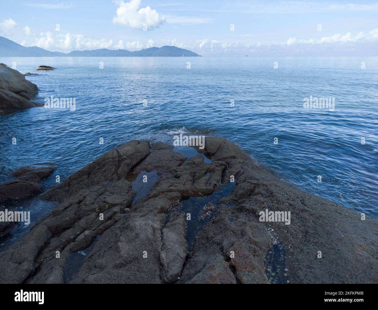 aerial image of the beach with lots of granite rocks Stock Photo - Alamy