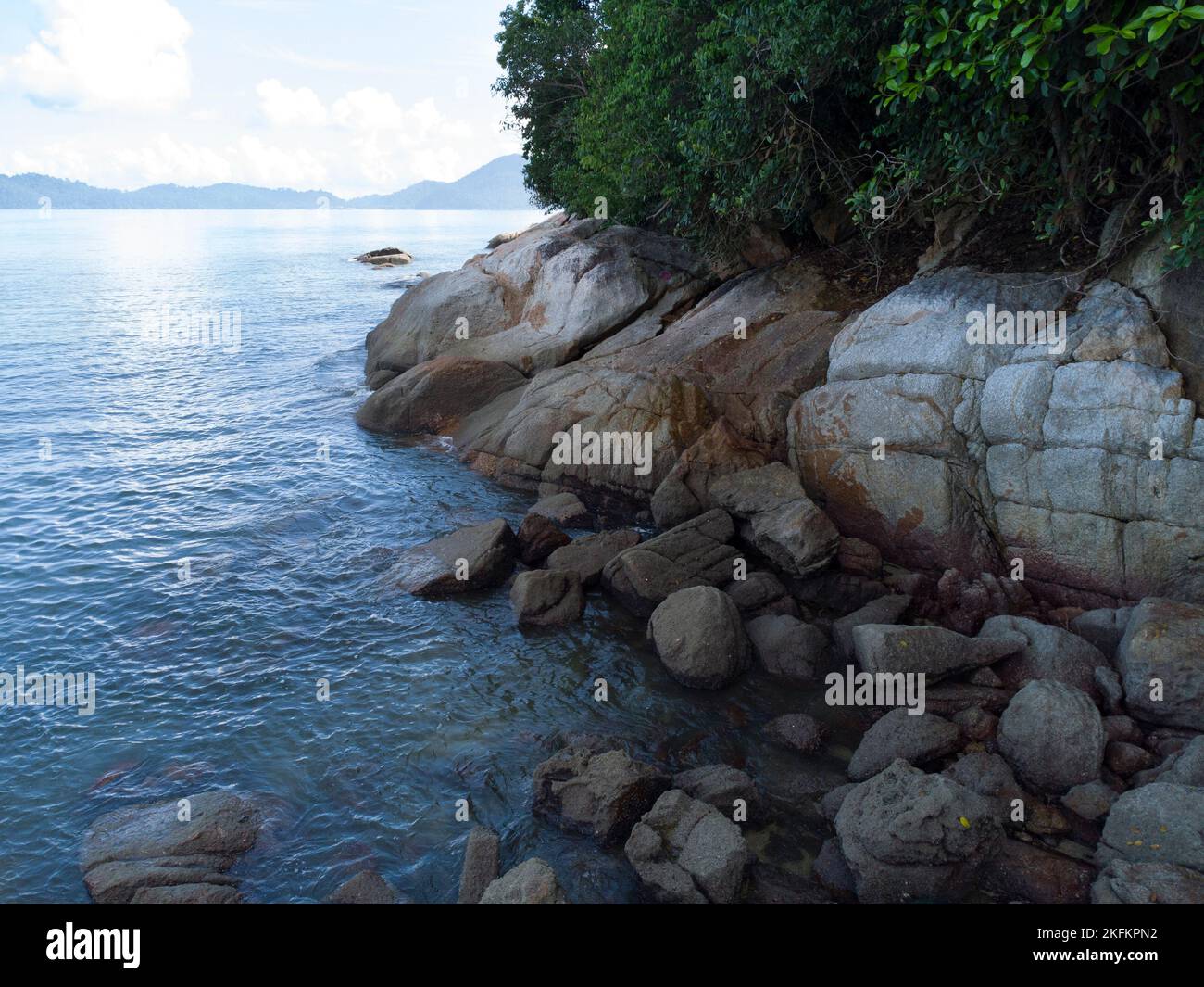 aerial image of the beach with lots of granite rocks Stock Photo - Alamy