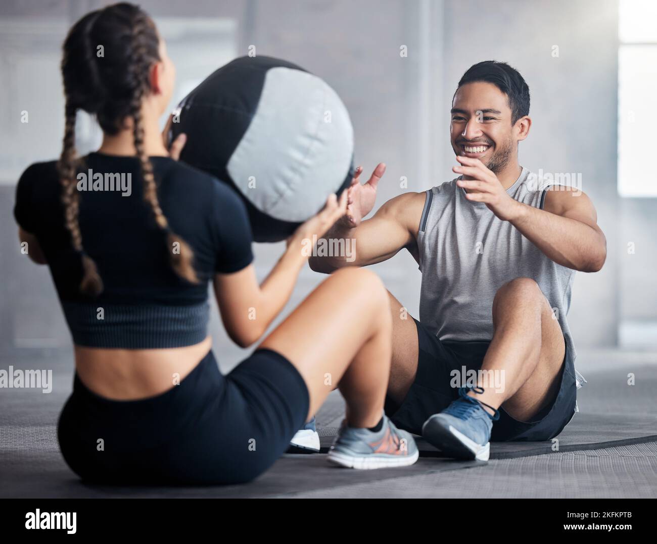 Fitness, ball and couple doing an exercise together for health ...