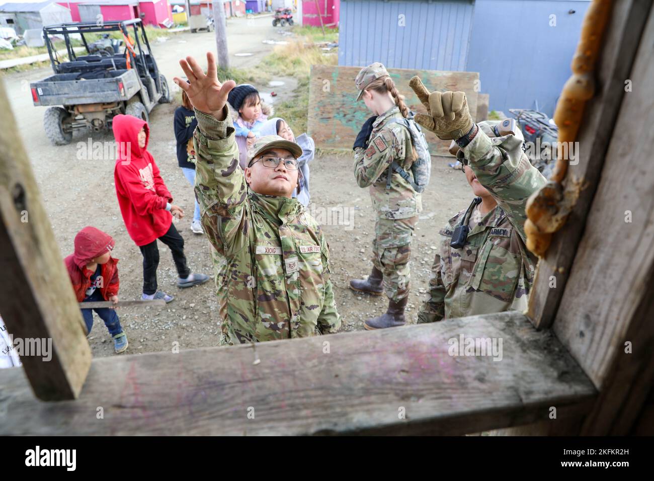 Alaska Army National Guard Spc. Tristan John, right, an infantryman ...