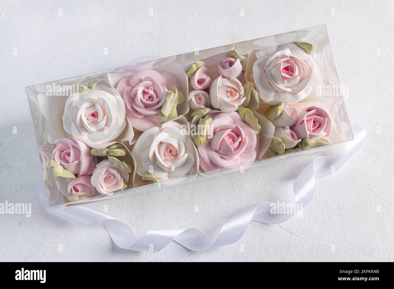 zephyr bouquet of flowers in a pink box on a light background Stock ...