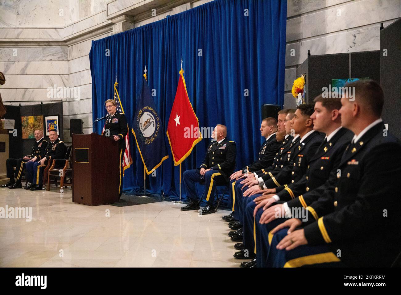Army Lt. Col. Carla Raisler introduces the newly commissioned officers ...