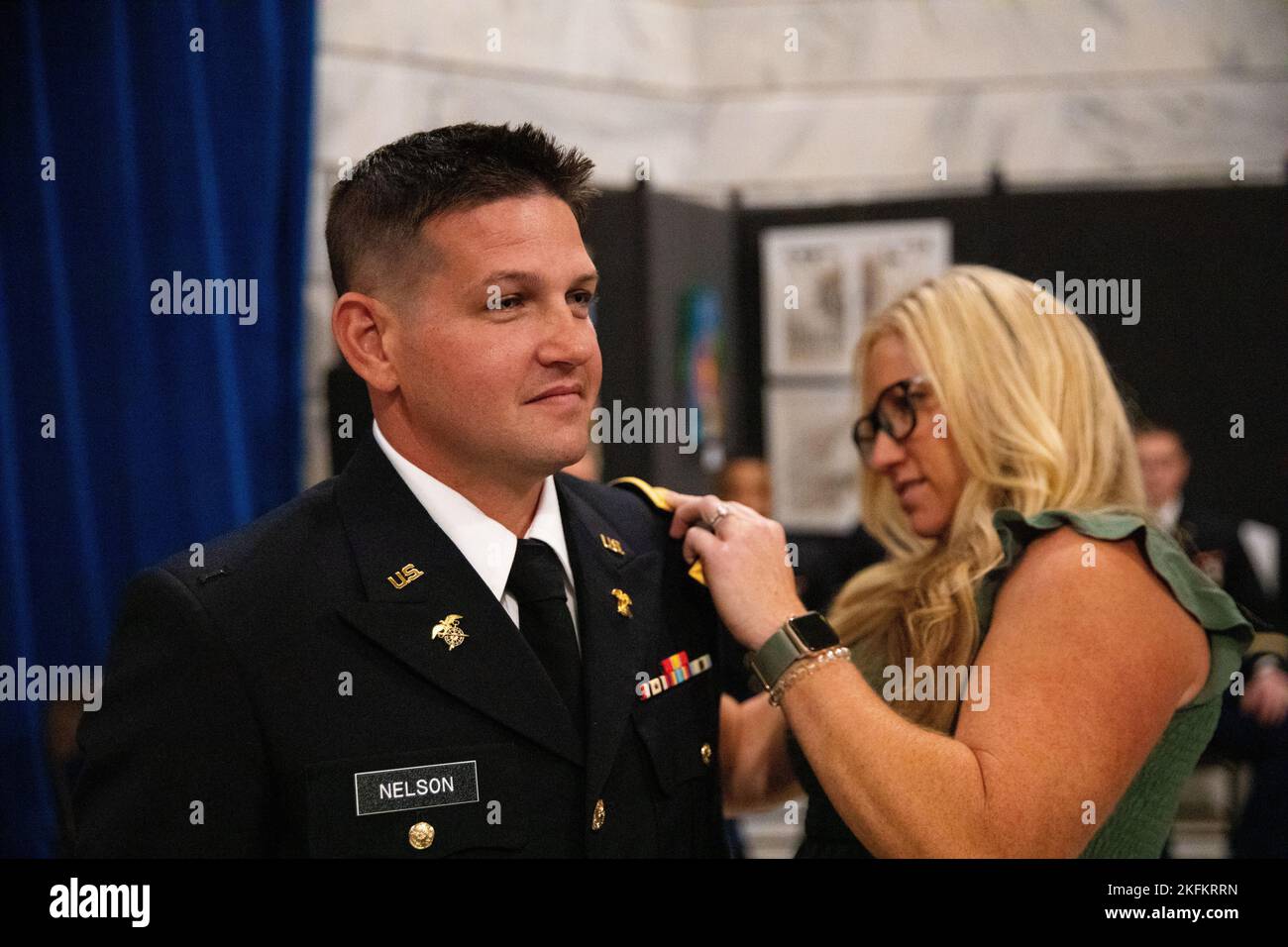 Army officer candidate Steven Nelson is pinned second lieutenant by his ...