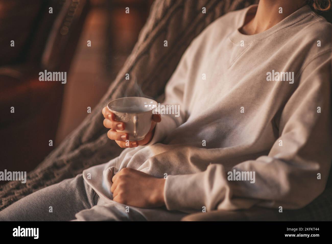 Young teen boy with long hair thoughtful look sad eyes negative mood ...