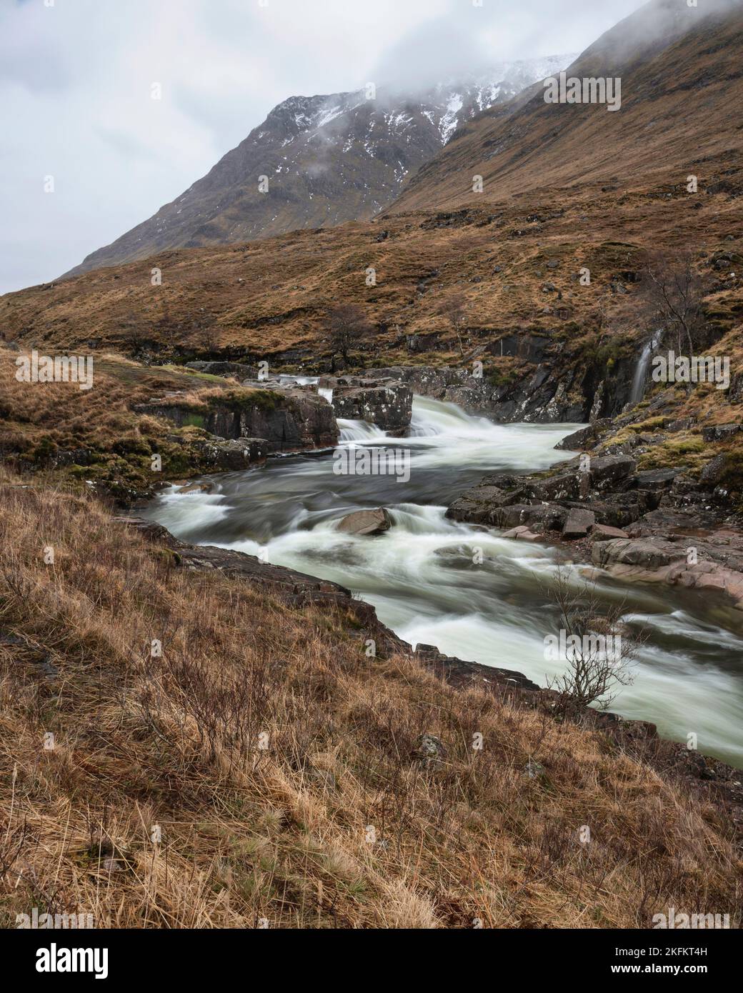 Beautiful Winter landscape image of River Etive and Skyfall Etive ...