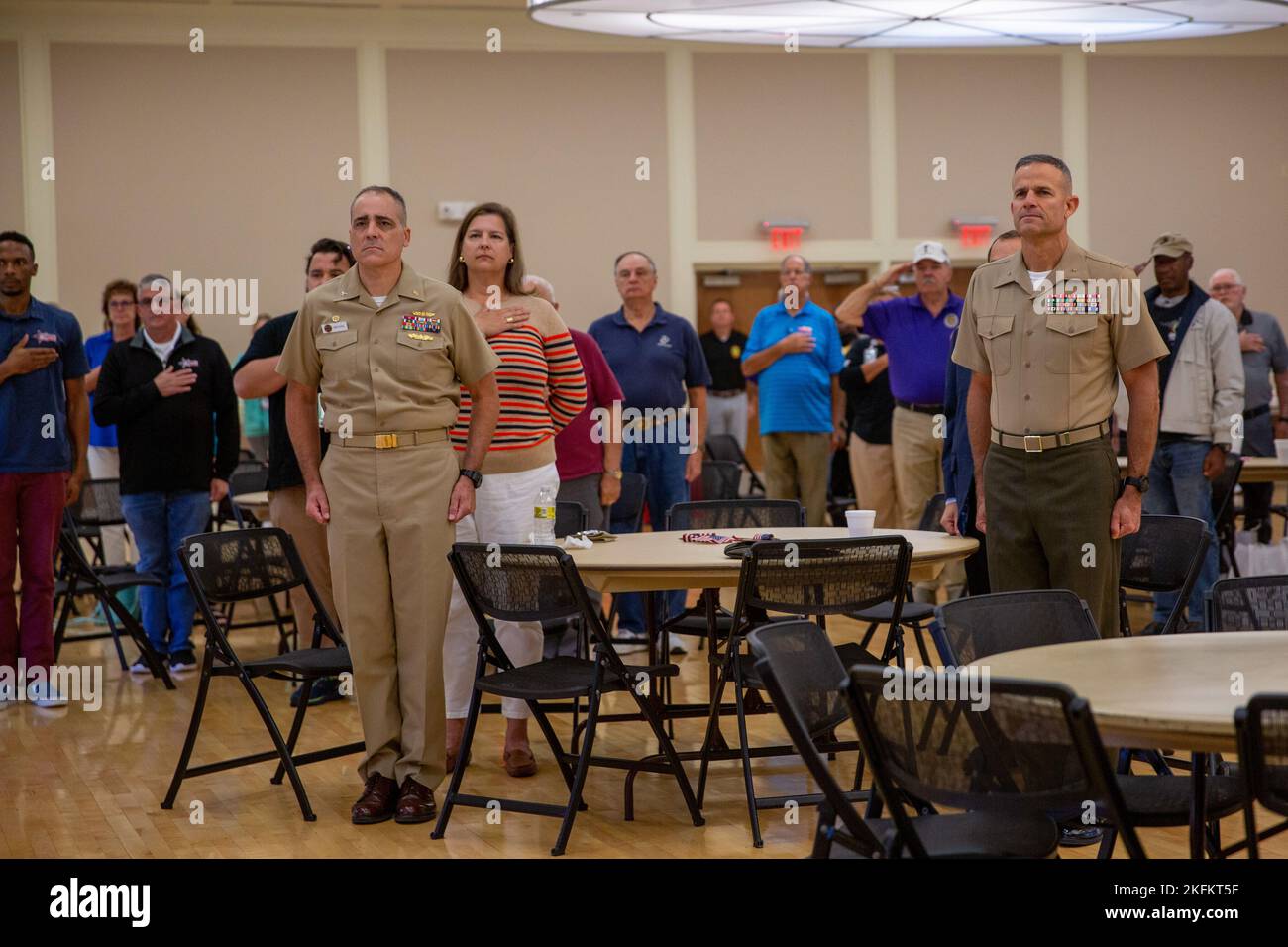 U.S. Navy Capt. Kevin J. Brown, left, commander and director, Naval ...