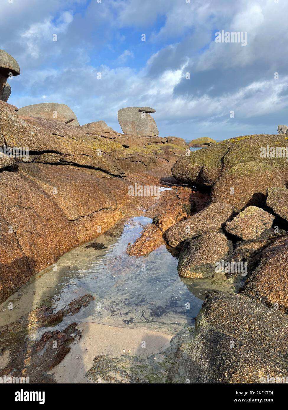 An aerial view of rock formations in Granitic rose Coast in Brittany ...