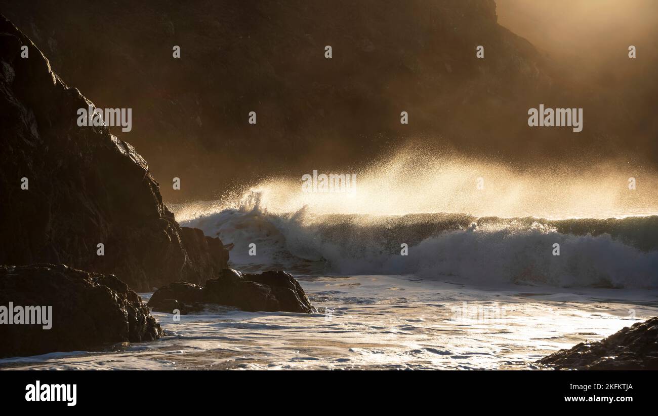 Epic landscape image of jade turquoise waves crashing onto shore and ...
