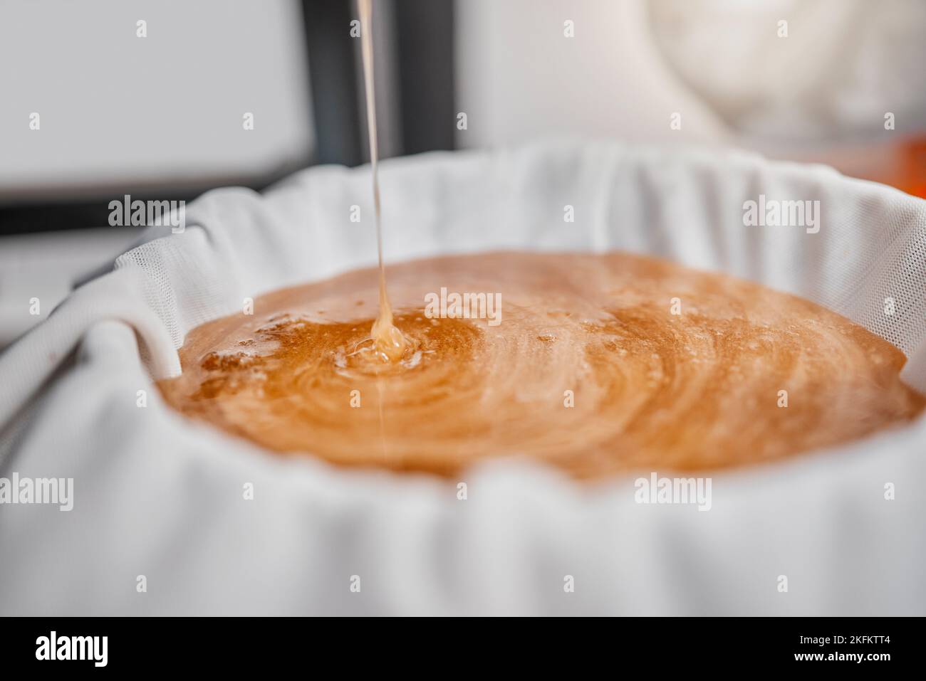 Honey, pour and production in a factory on a farm for sweet, natural ...