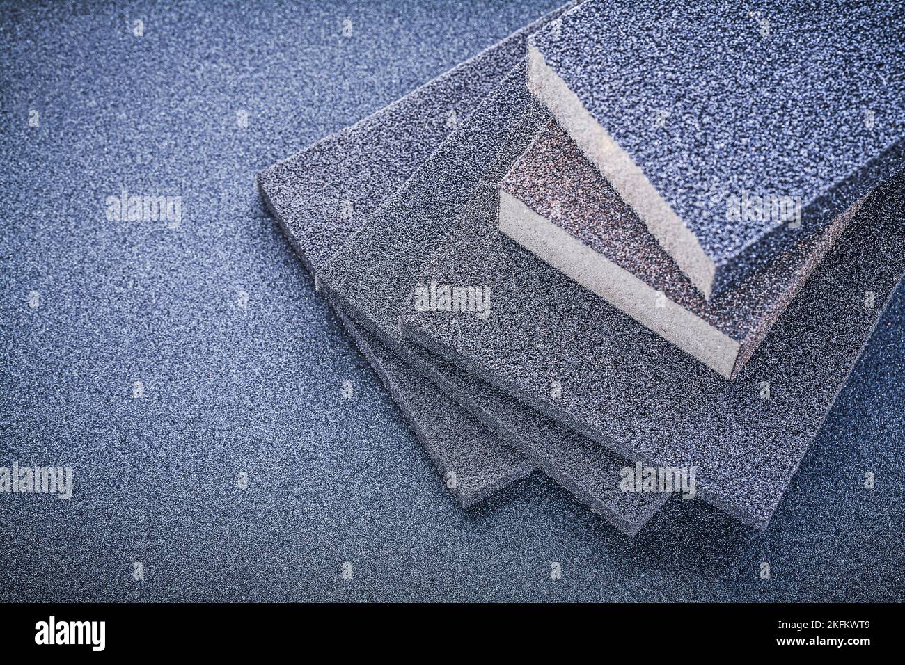 Abrasive sponges for grinding on emery paper top view Stock Photo - Alamy