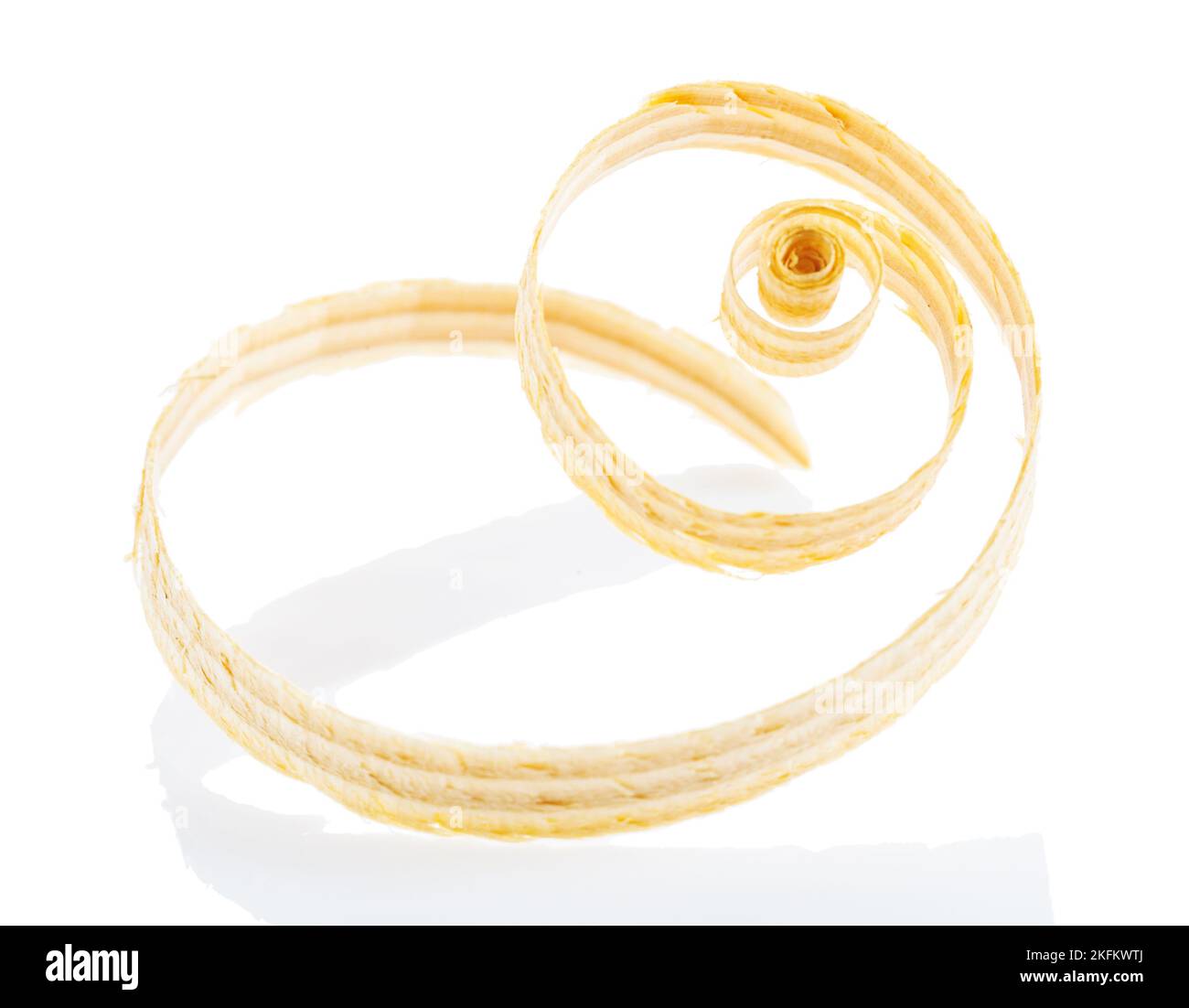 a single wooden shaving isolated on white Stock Photo - Alamy