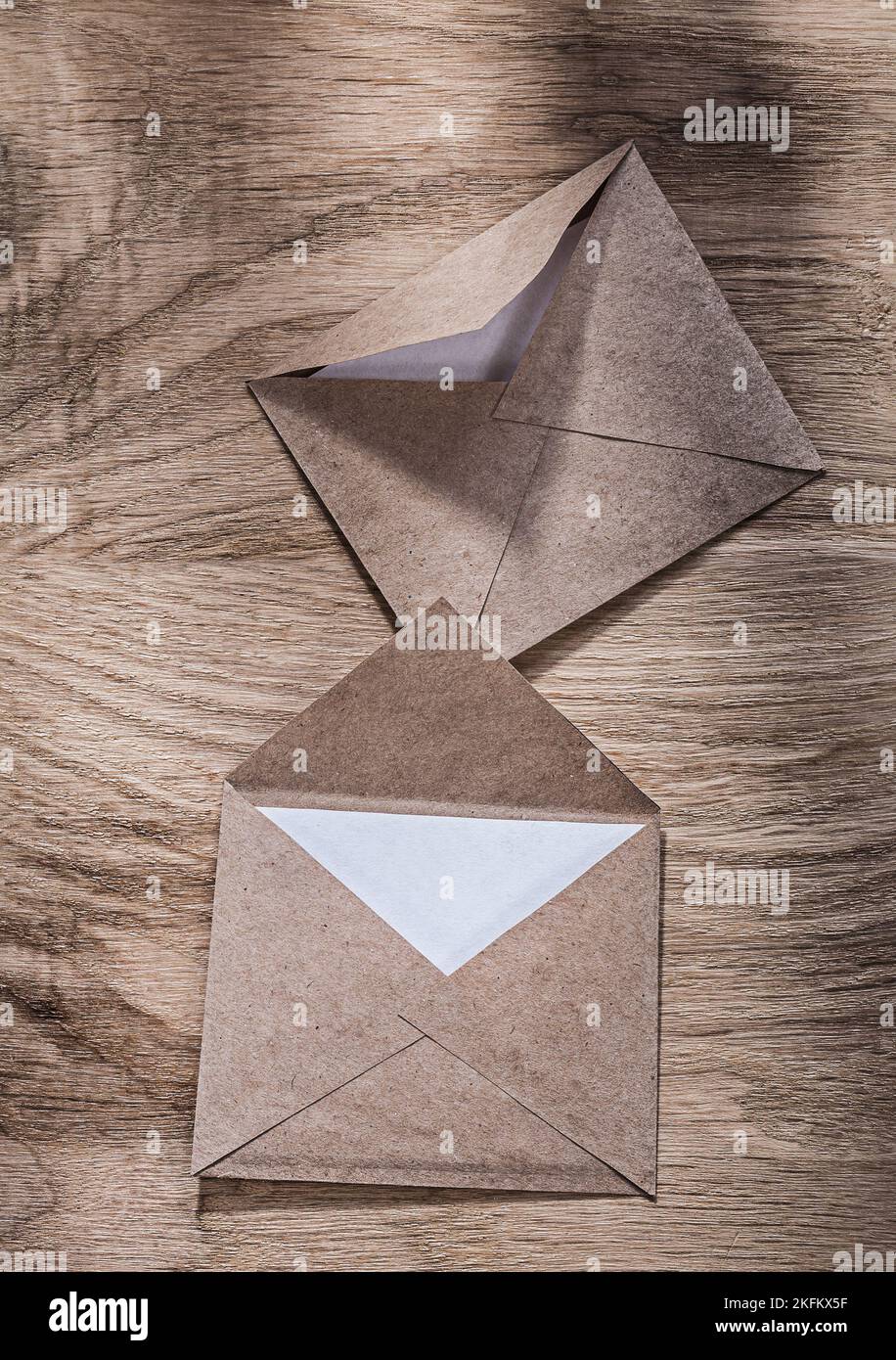 Aged post envelopes on wooden board vertical image Stock Photo - Alamy