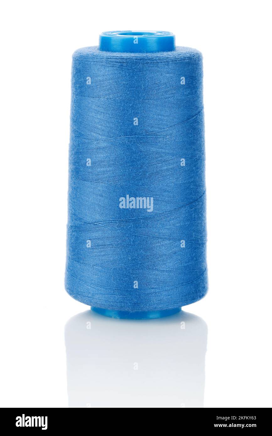 blue thread on Bobbin Stock Photo - Alamy