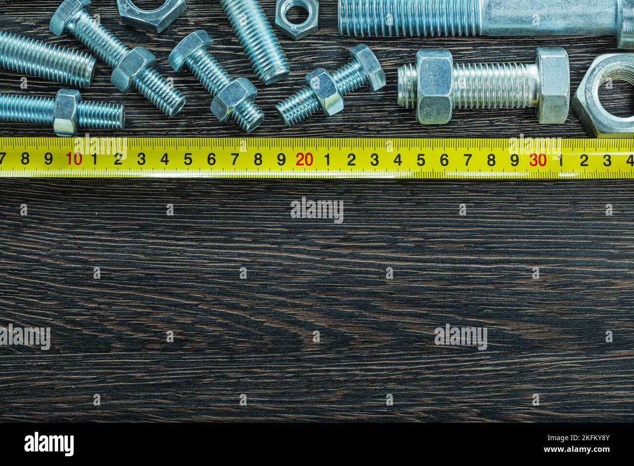 Nuts and tape measure hi-res stock photography and images - Alamy