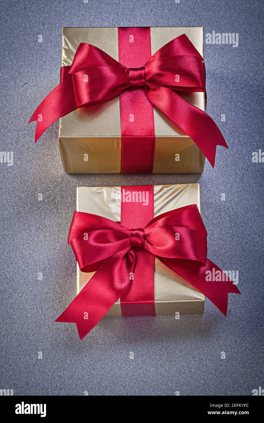 Boxes with presents on grey background holidays concept Stock Photo - Alamy
