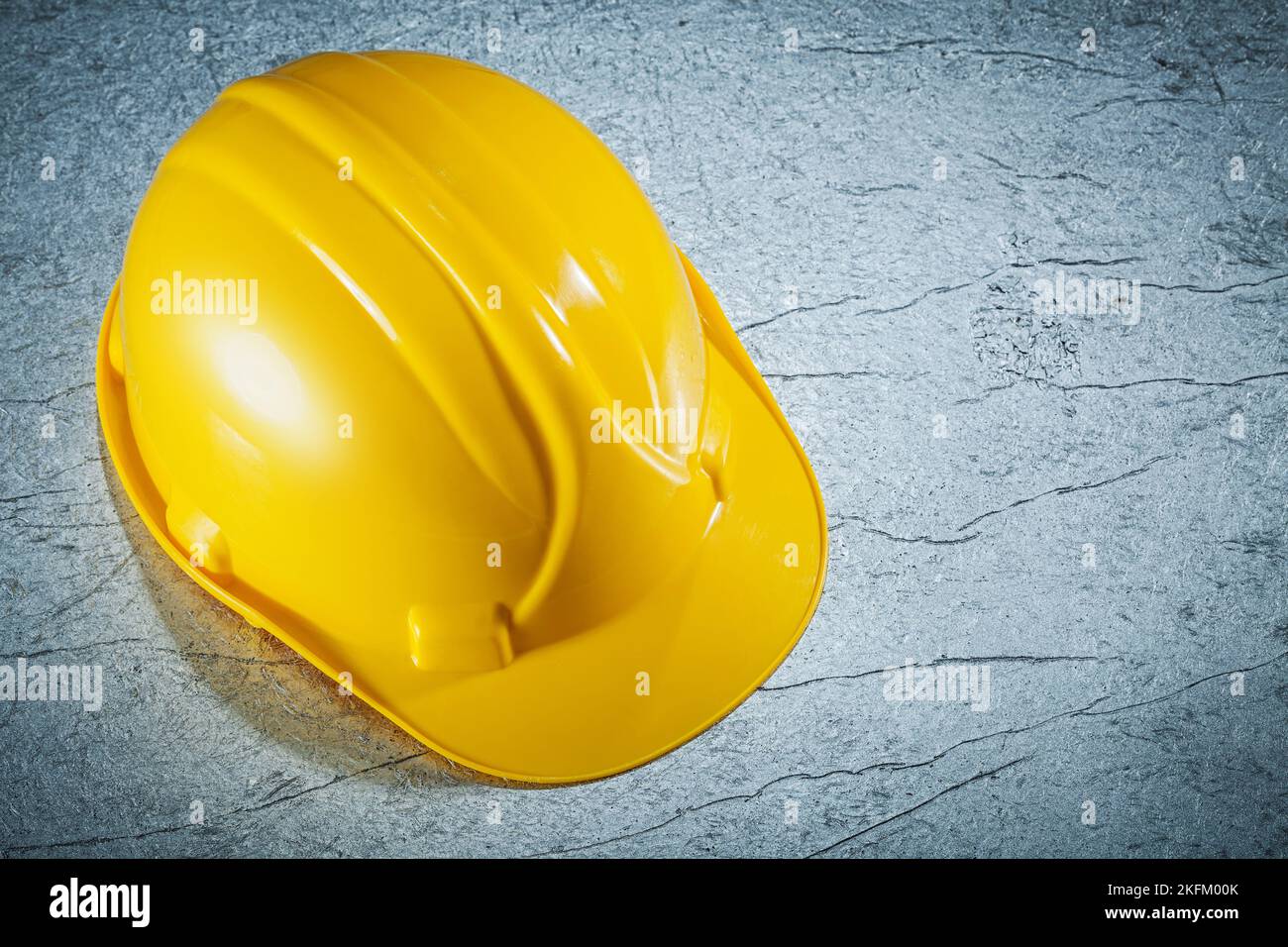 Building helmet on metallic surface construction concept Stock Photo ...