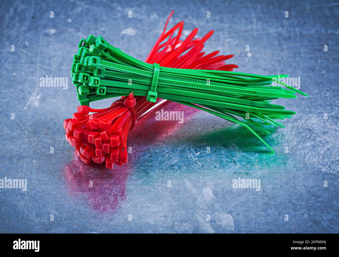 Cable ties on metallic background construction concept Stock Photo - Alamy