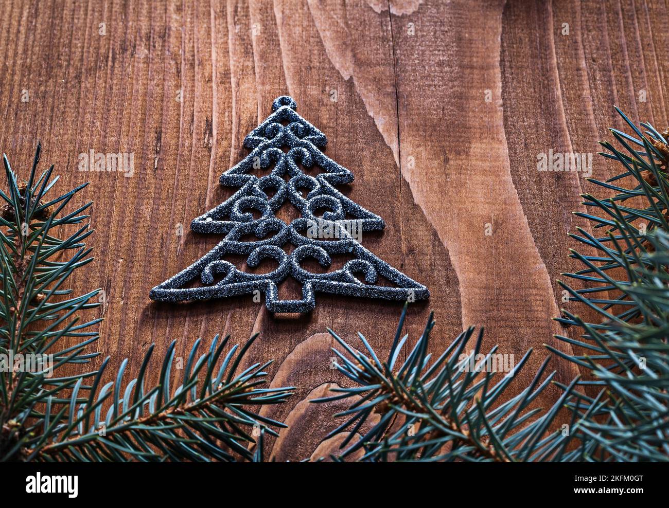 christmas card simbol fir tree toy and branches of fir tree on old ...