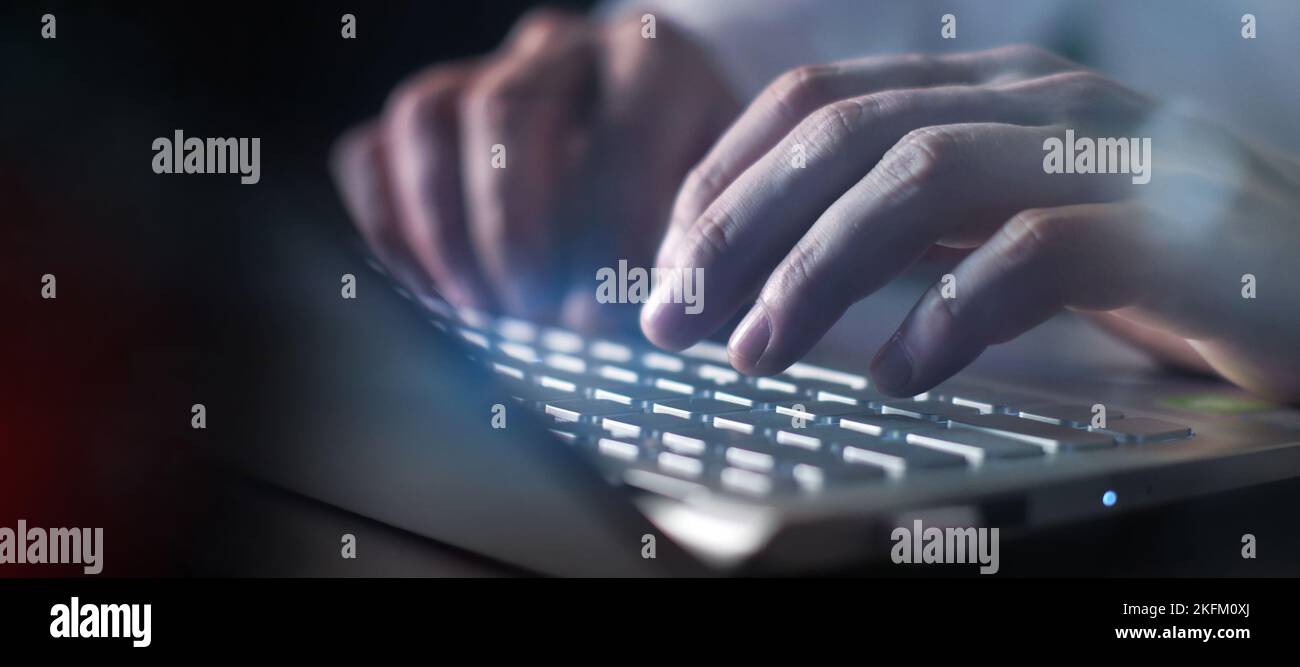 Close-up of male hands on laptop keyboard Stock Photo - Alamy