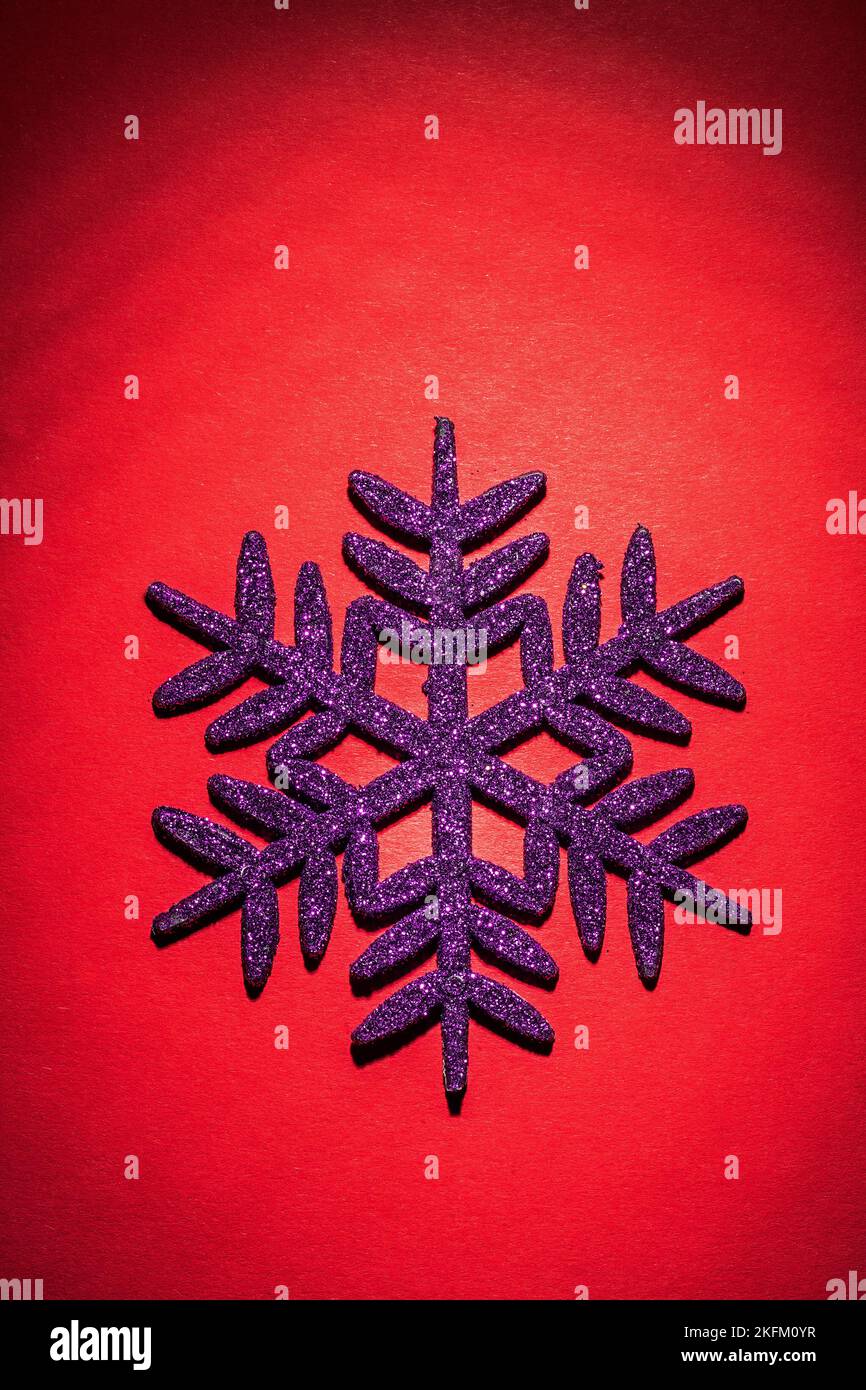 christmas toys simbol flake on red background Stock Photo - Alamy