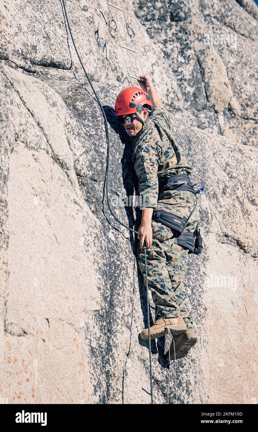 U.S. Marine Corps Sgt. Joshua Sanchez, a mountain warfare instructor ...