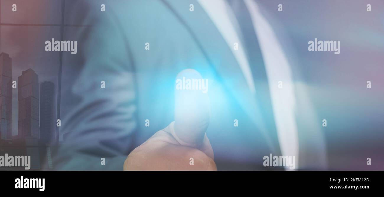Businessman scanning fingerprint with invisible futuristic interface ...