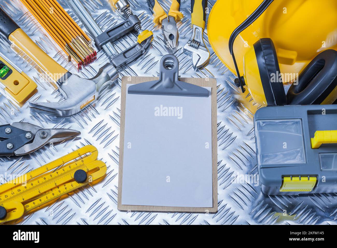 clipboard with white sheet of paper and set construction tools Stock ...