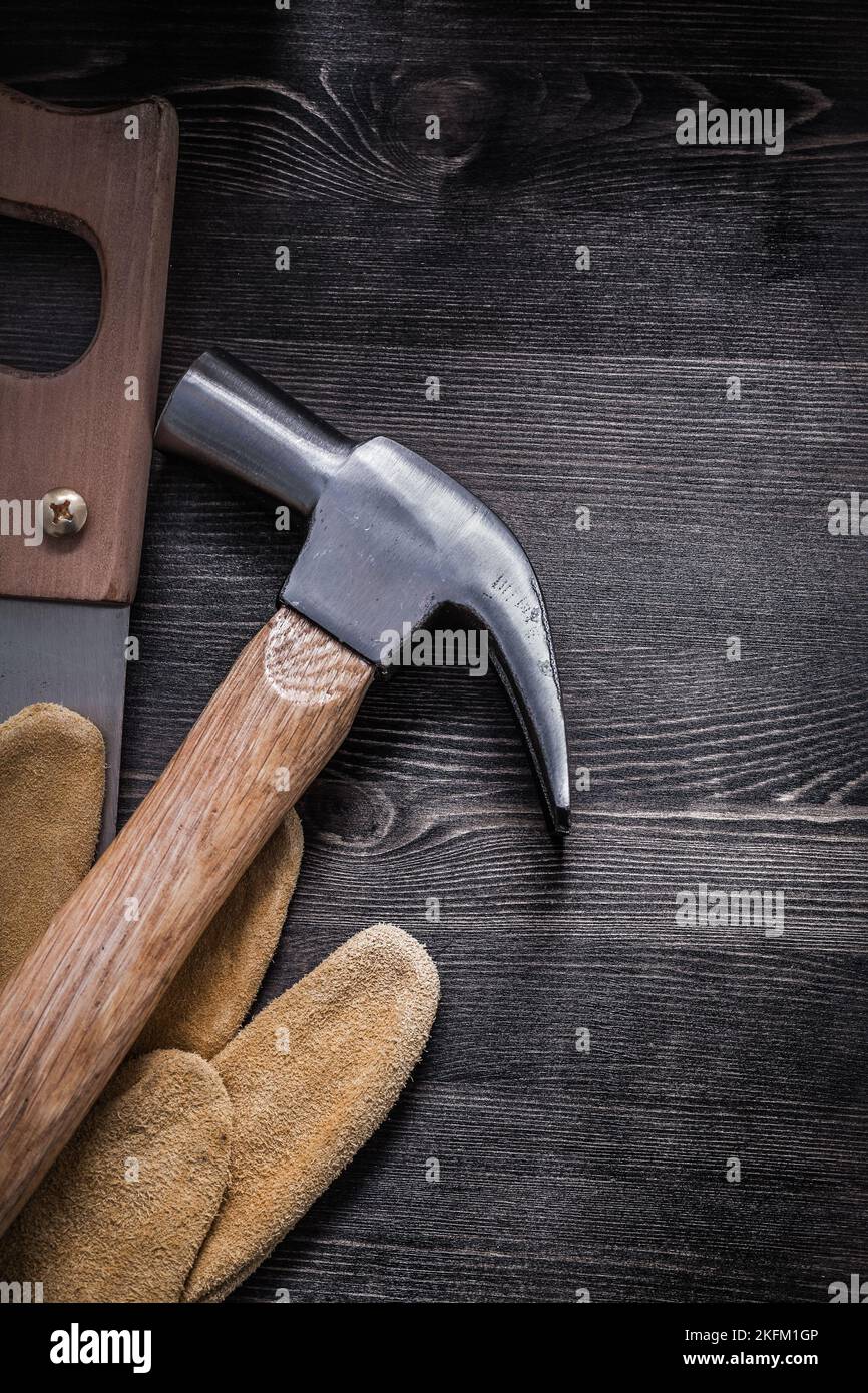 Collection of hack-saw claw hammer working leather gloves vertical view ...