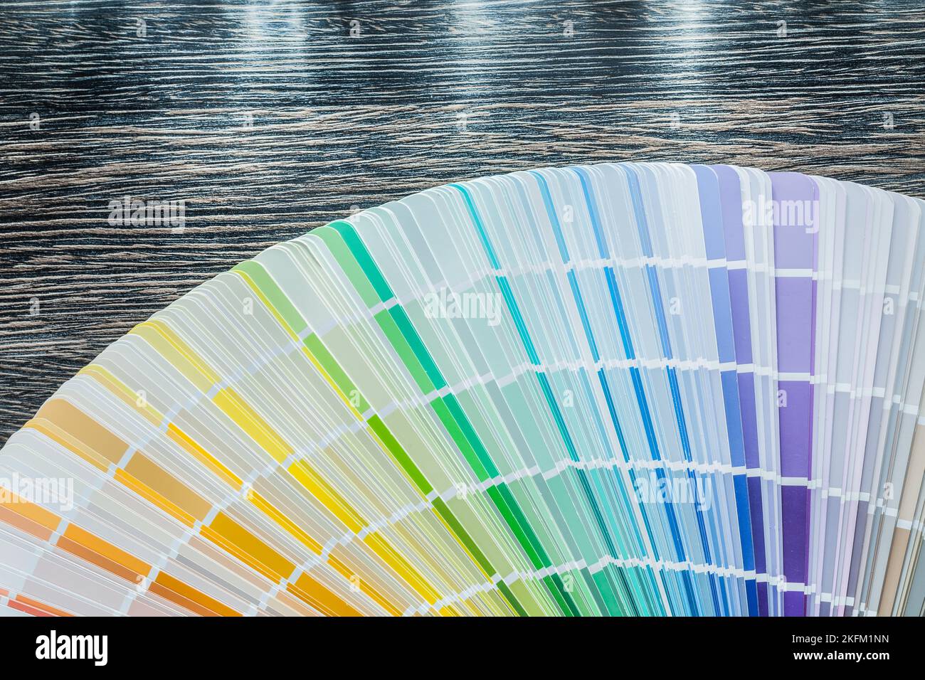 Color palette fan on wooden board Stock Photo - Alamy