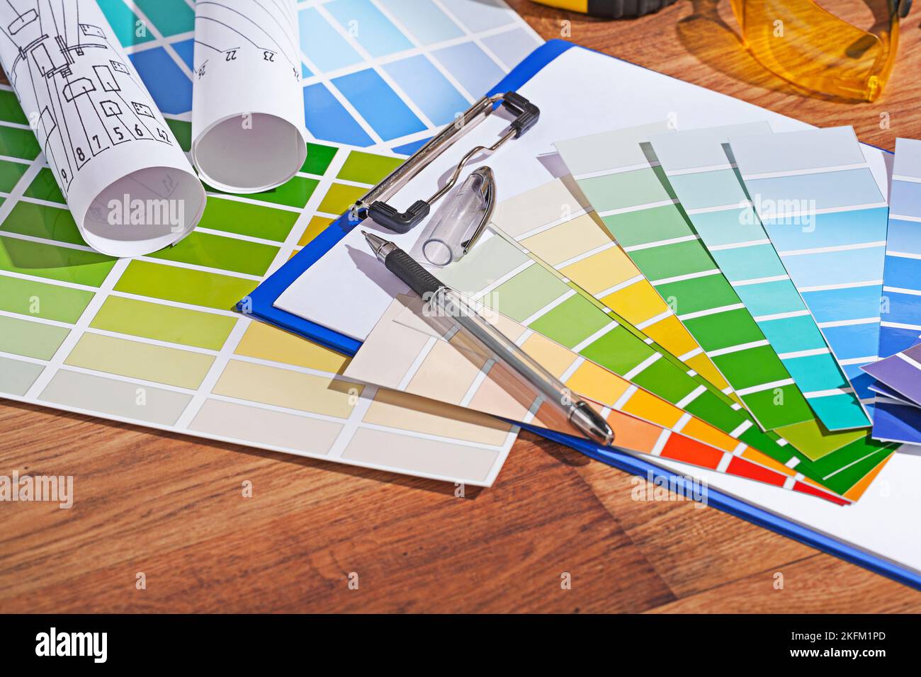 color palettes on wooden table Stock Photo - Alamy