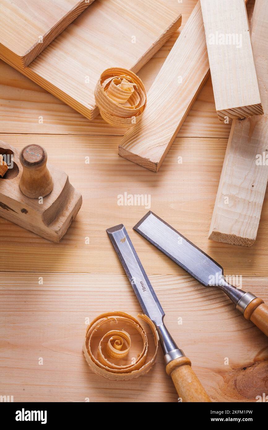 composition close up view on woodworkers plane and carpentry chisels ...