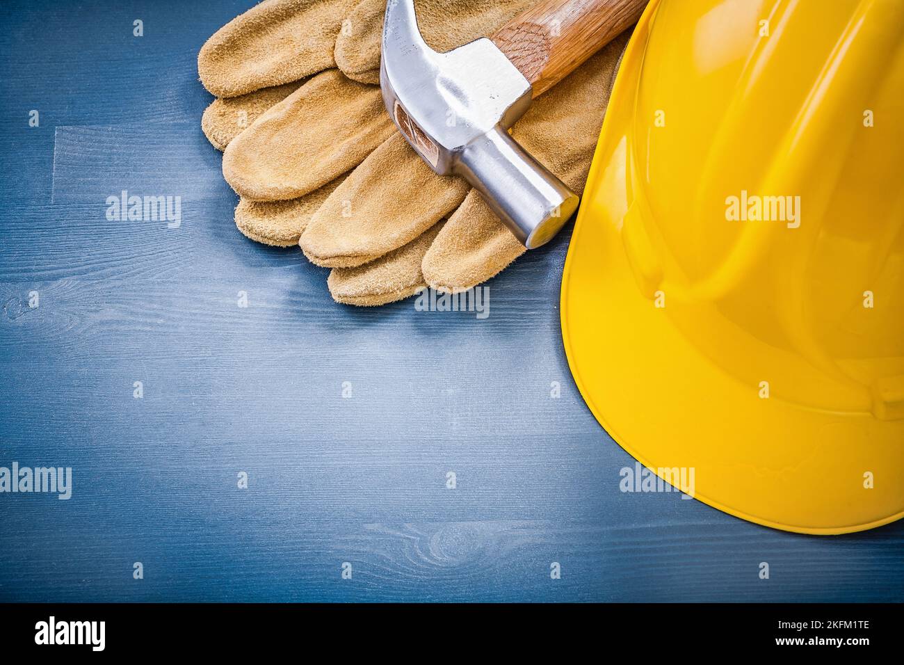 Composition of building helmet claw hammer protective gloves ...