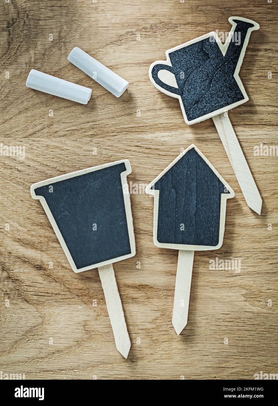 Composition of black wooden chalkboard price sign tags on wood board ...
