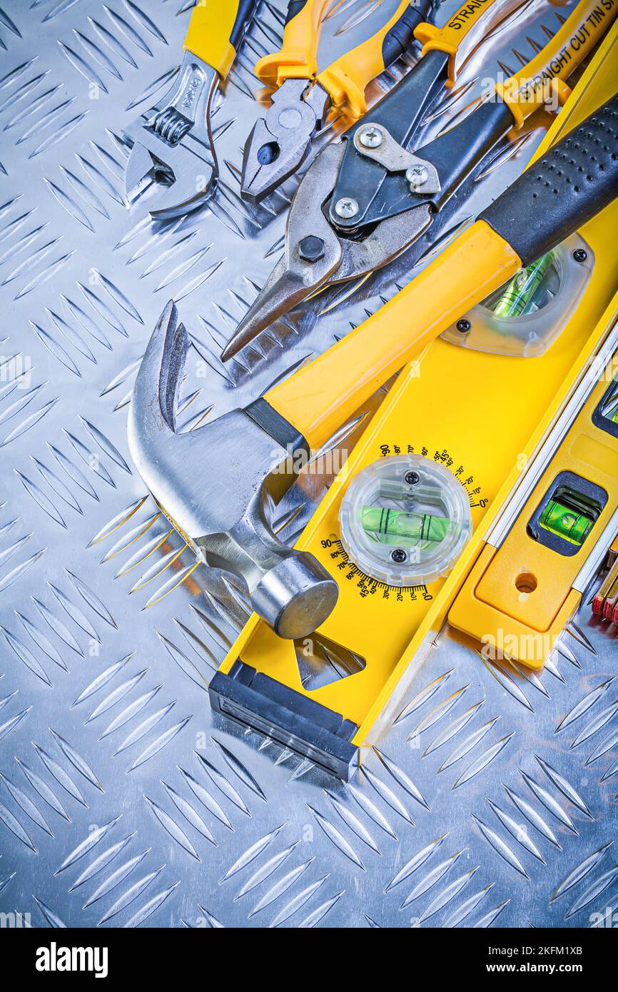 Composition of construction tools on corrugated metal plate maintenance ...