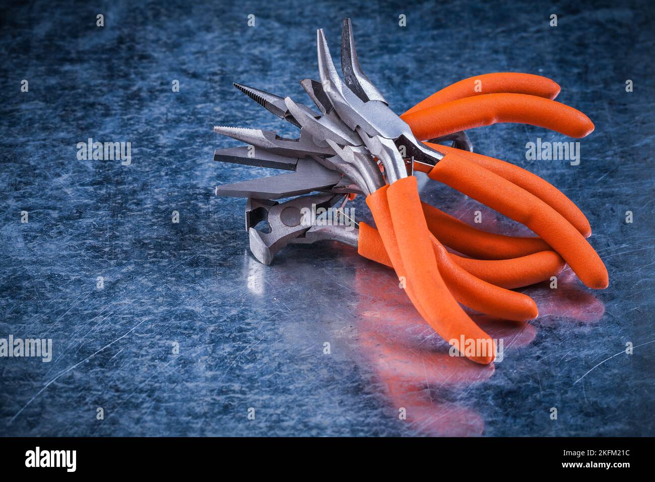 Composition of insulated electric gripping tongs nippers top view image ...