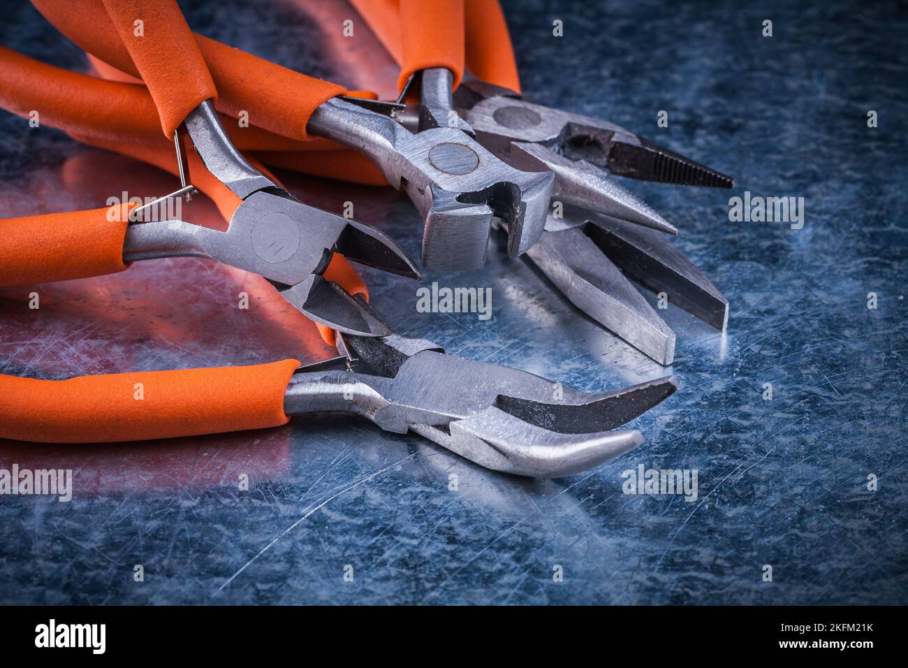 Composition of insulated cutting pliers gripping tongs with rubber ...